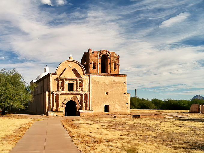 Holy guacamole, Batman! This mission's got more curves than a telenovela star. Tumacacori's facade is like a time-traveling selfie backdrop.