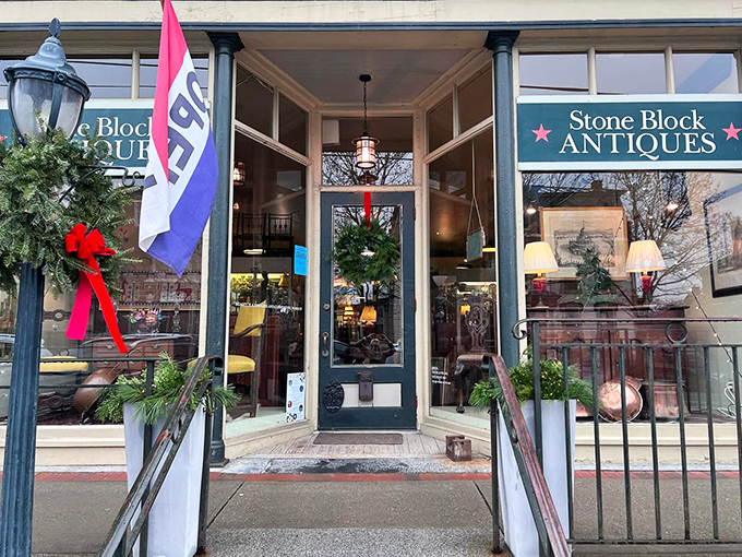 Step into a time capsule! Stone Block Antiques beckons with its charming storefront, promising treasures that'll make your inner history buff swoon.