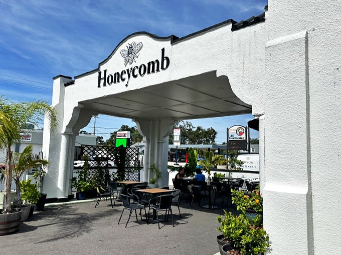 A crisp white facade with a honey bee logo welcomes visitors like a warm hug from your favorite aunt's kitchen.