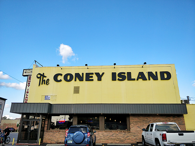 A beacon of breakfast bliss! This sunny yellow building isn't just a hot dog haven&mdash;it's a morning meal mecca waiting to be discovered.