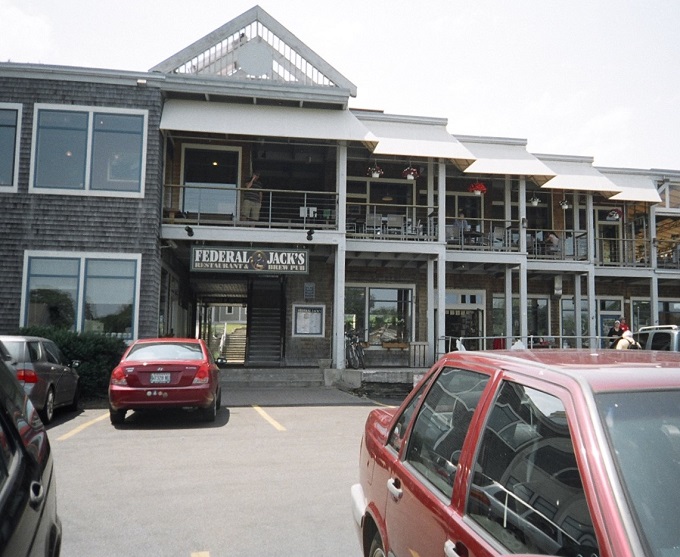 A coastal gem that's more inviting than a lobster trap! Federal Jack's stands proud, its weathered shingles and expansive windows promising a feast for both eyes and stomach.