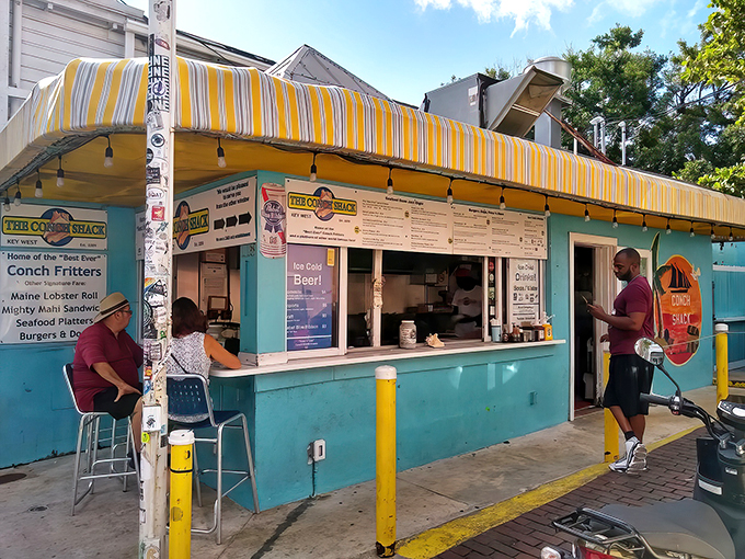 A slice of paradise, served with a side of humor! The Conch Shack's vibrant exterior promises a feast for both your eyes and taste buds.
