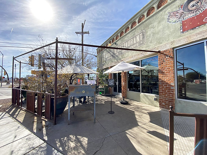 A charming brick-and-stucco facade welcomes visitors to this Tucson gem, where vintage meets modern under the desert sun.
