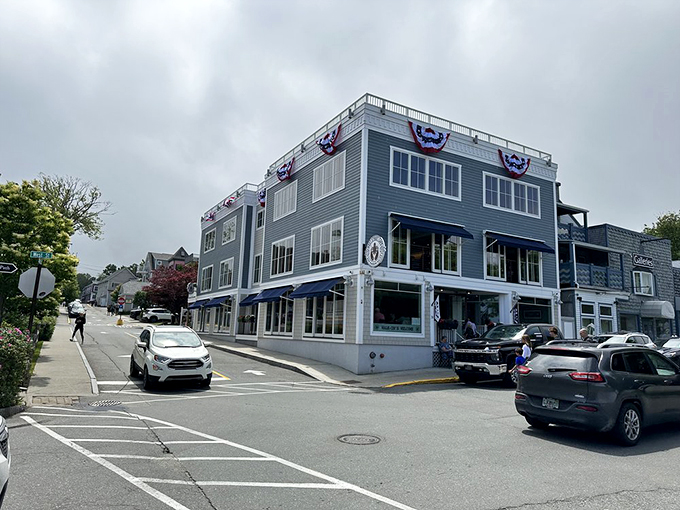 A slice of New England heaven, this gray-blue beauty stands proudly on West Street, decked out in patriotic bunting like it's dressed for a coastal celebration. Photo credit: West Street Cafe