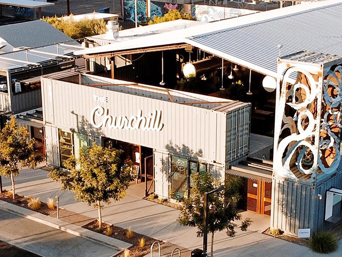 The Churchill stands proud in downtown Phoenix, where shipping containers have found their second calling as an urban gathering spot.