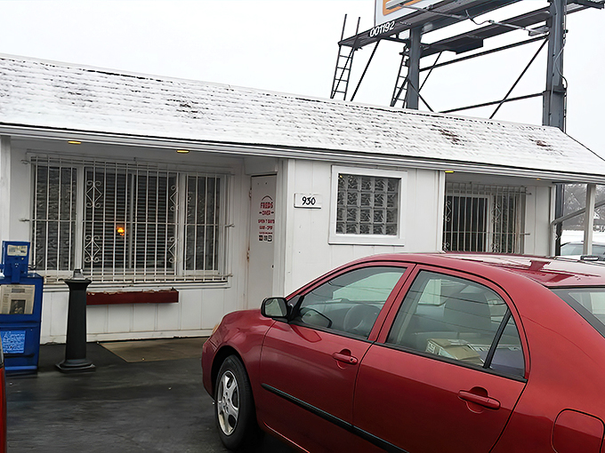 Welcome to Fred's Diner, where the charm is as red as the roof and the hospitality is as warm as the coffee inside.