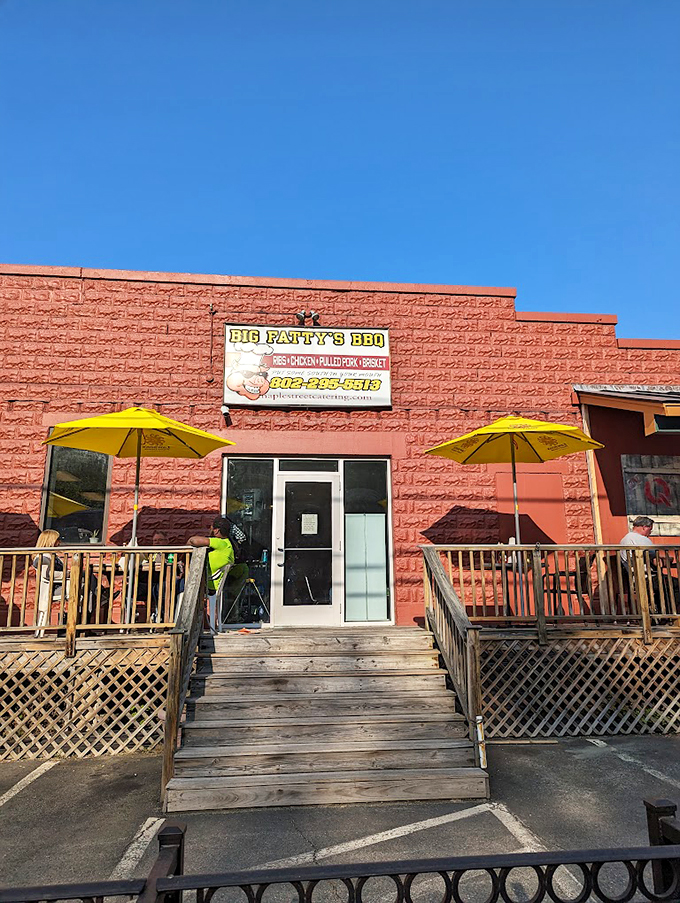 Welcome to BBQ paradise! Big Fatty's bright red exterior is like a beacon for hungry souls, promising smoky delights within.
