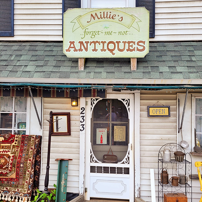 The charming storefront of Millie's beckons with its vintage sign and screen door &ndash; like stepping into your favorite nostalgic movie set.