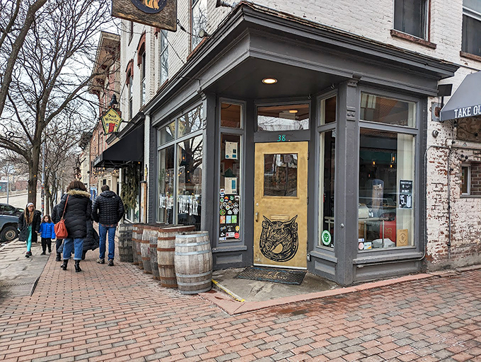 Step right up to the Mule Bar, where the golden door beckons like a portal to comfort food paradise. This unassuming facade hides a world of culinary delights waiting to be discovered. 
