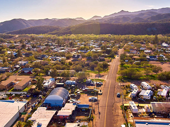 The iconic Rock Springs Caf&eacute; stands proudly against the Arizona sky, its vintage signage and rustic charm beckoning pie lovers since 1918.