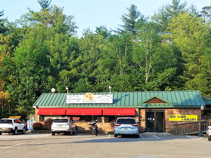Tucked away in Windham's woods, Bob's Seafood's brick-and-green exterior promises treasures from the sea, while those red awnings beckon like maritime flags.