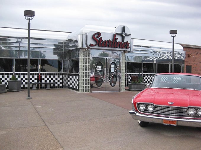 Chrome-clad and gleaming like a spaceship from the 1950s, Starliner Diner's facade promises a journey back to the golden age of American dining.
