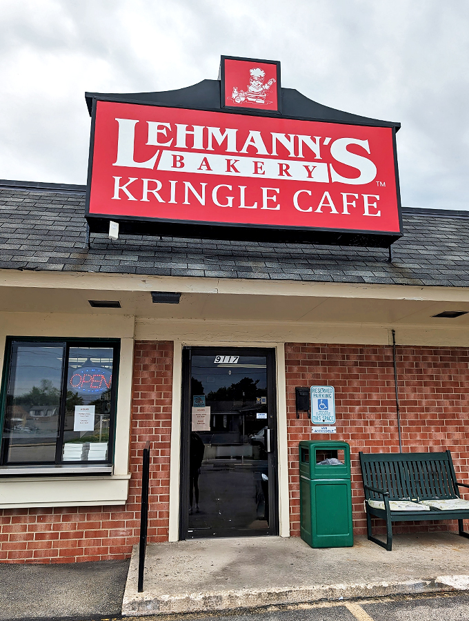 Welcome to kringle paradise! Lehmann's bold red sign beckons pastry lovers like a lighthouse guiding sugar-starved sailors to shore.