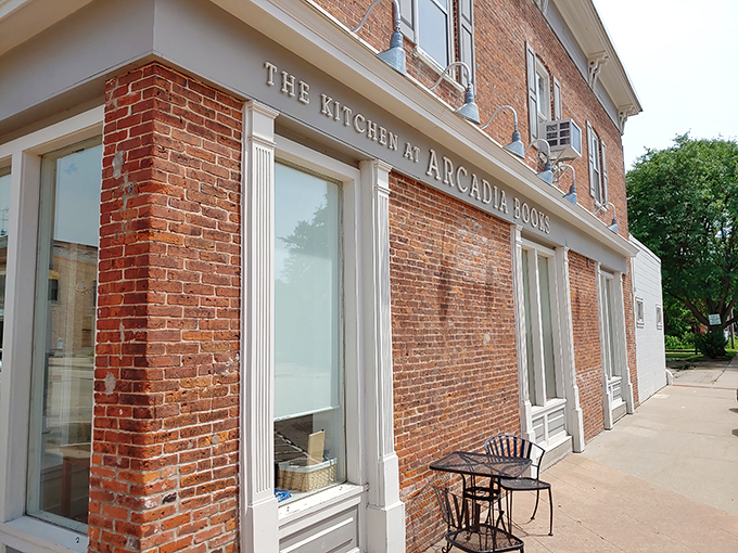 Brick and mortar never looked so inviting! Arcadia Books' charming facade is like a warm hug for bibliophiles, complete with sidewalk seating for those who just can't wait to crack open their new literary treasures.