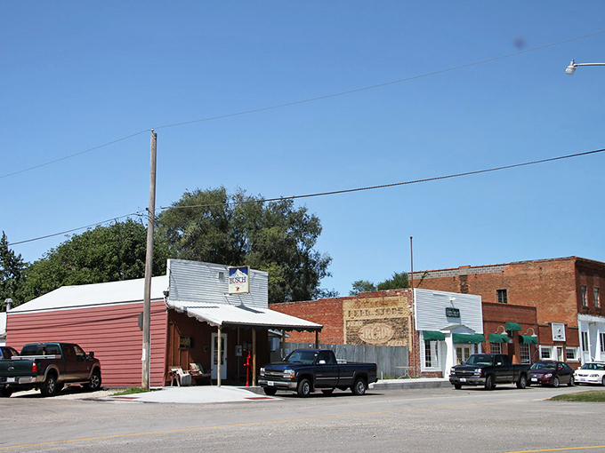 Main Street Maquon, where pickup trucks and small-town charm create the perfect snapshot of unhurried Midwestern life.