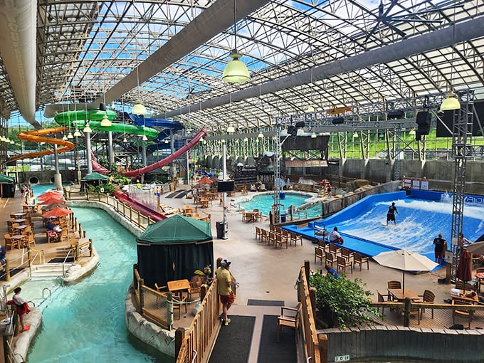 A tropical paradise under glass: The Pump House's sprawling layout features colorful waterslides, a lazy river, and endless opportunities for family fun.