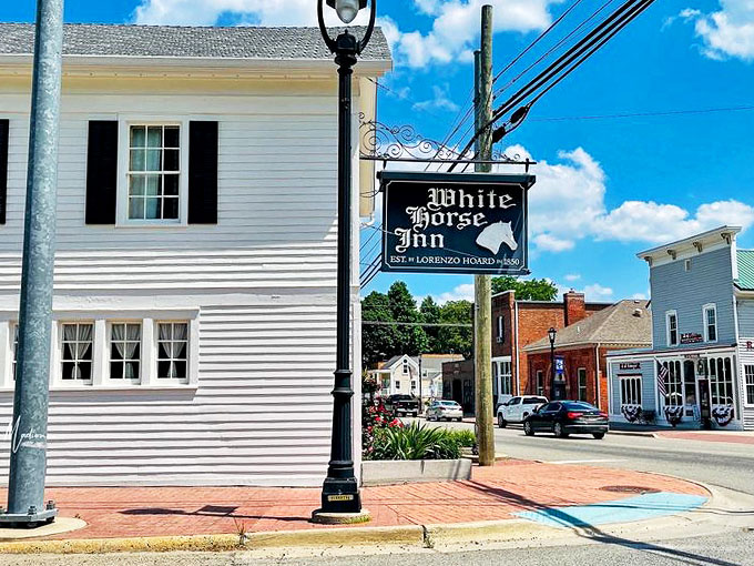 Step into a slice of Americana! The White Horse Inn's charming facade whispers tales of bygone eras while promising modern culinary delights inside.