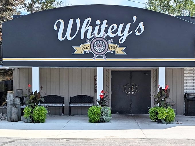 Welcome to Whitey's, where nautical charm meets Midwest hospitality! This facade promises a voyage of flavor that'll have you hooked faster than you can say "fish and chips."