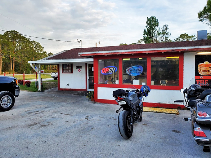 Welcome to flavor town! The Red Top Pit Stop's cheery facade promises a feast for both eyes and stomach.