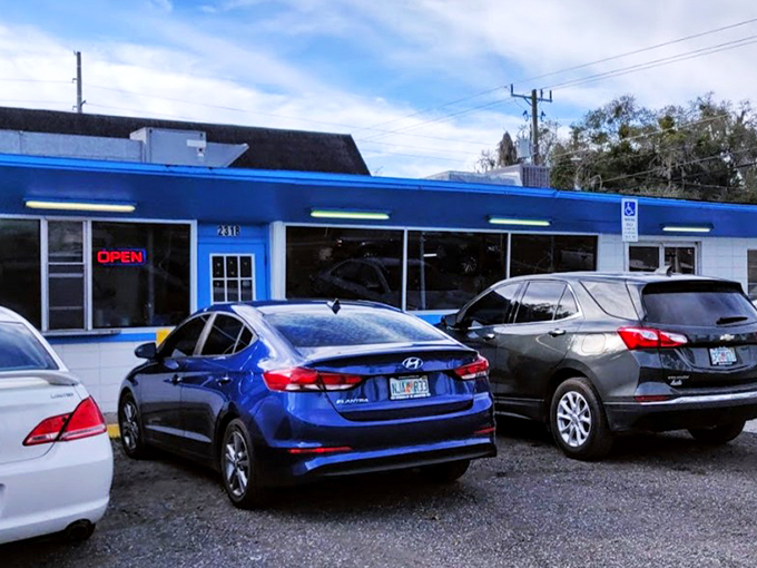 Welcome to Colee's, where the blue exterior is as inviting as a Florida sky. This unassuming facade hides a treasure trove of comfort food that'll make your taste buds do the cha-cha.