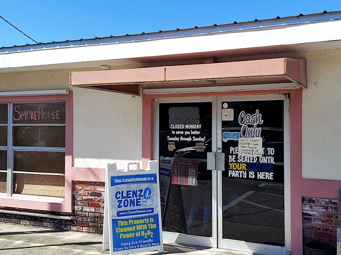 Welcome to flavor town! This unassuming pink-trimmed facade hides a treasure trove of Southern comfort food that'll make your taste buds dance.