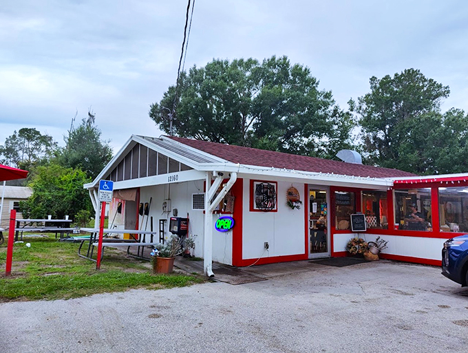 Welcome to flavor town! This unassuming red-roofed diner might just be Lakeland's best-kept secret. Prepare your taste buds for a journey!