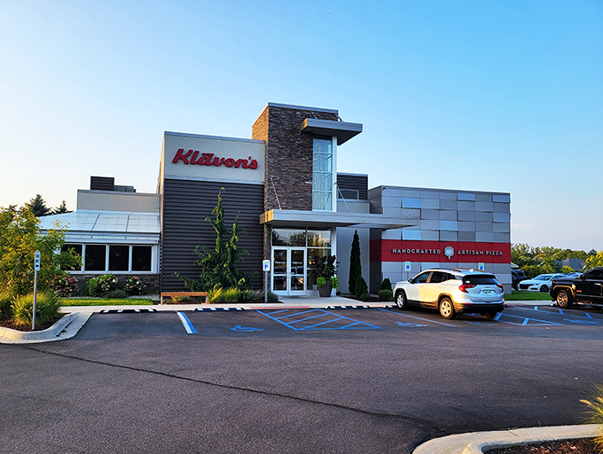 Welcome to pizza paradise! Klavon's modern exterior beckons with the promise of cheesy delights, like a siren call to carb-loving sailors.