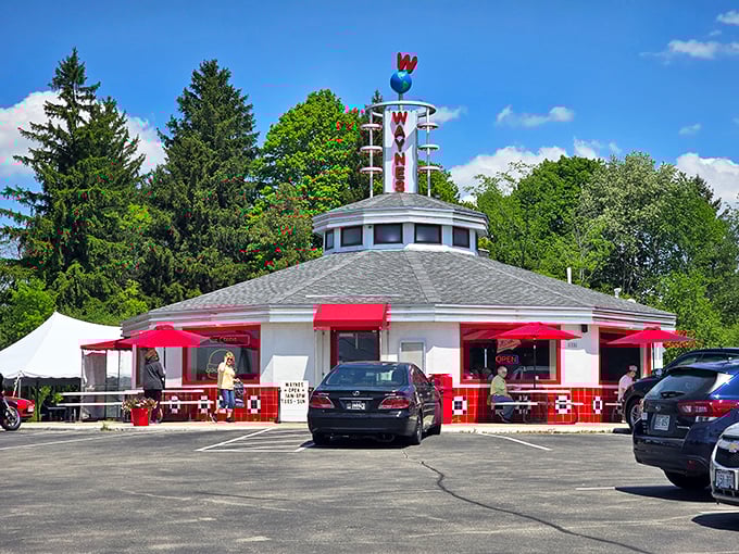 A retro time capsule with a cherry on top! Wayne's Drive-In stands proud, its iconic sign beckoning hungry time travelers to step back into a tastier era.