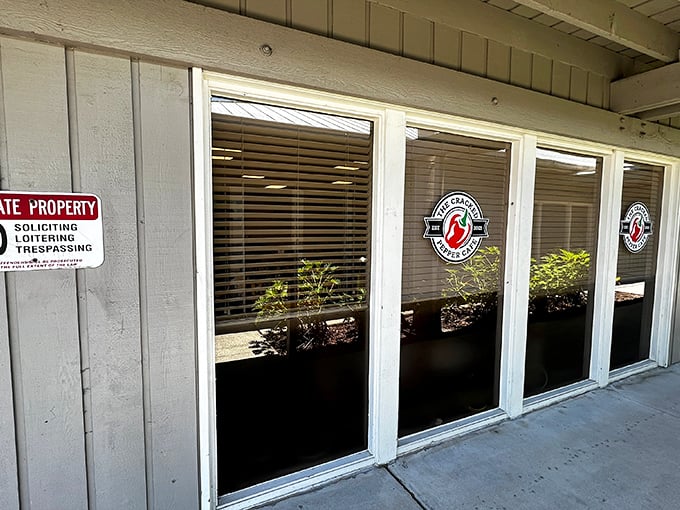 No soliciting, loitering, or trespassing - but they forgot to add "No resisting the aroma of freshly grilled sandwiches!" The Cracked Pepper Cafe's exterior promises a no-frills feast for the senses. Photo credit: Erik Ramirez