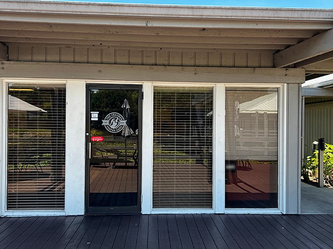 Welcome to flavor town! The Cracked Pepper Cafe's unassuming exterior hides a world of culinary delights waiting to be discovered. Photo credit: Erik Ramirez