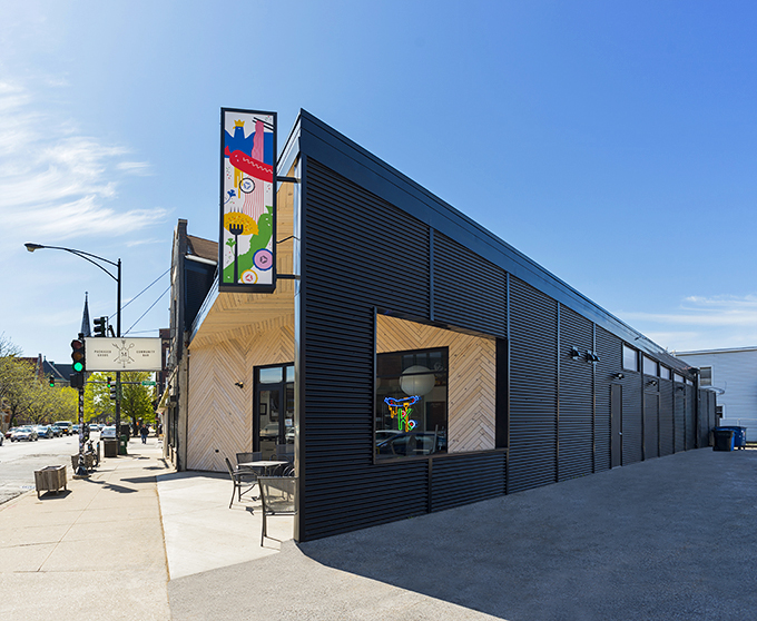 Sleek meets street art! Kimski's exterior is like a cool kid's treehouse got a modern makeover and decided to serve amazing food.