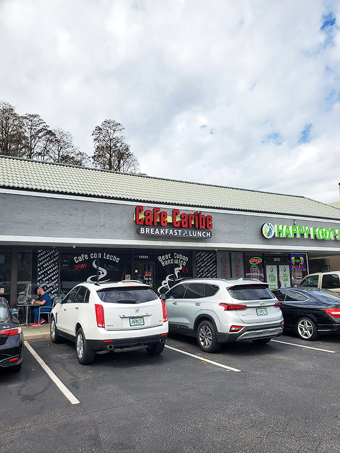 Welcome to flavor town! Cafe Caribe's unassuming exterior hides a world of culinary delights, proving that sometimes the best things come in strip mall packages. Photo credit: DANILO ROJAS