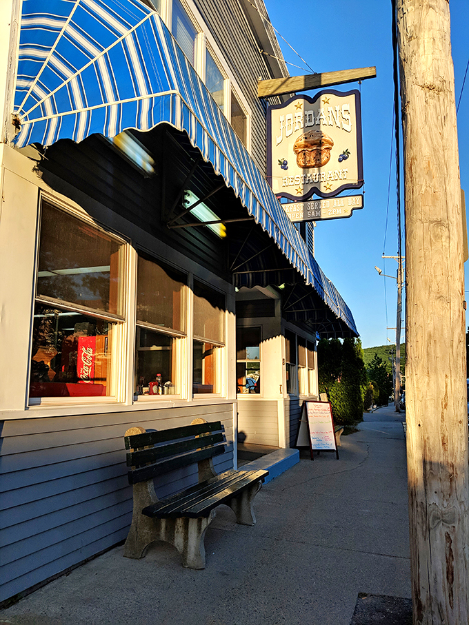 A slice of Americana served with a side of Maine charm. Jordan's Restaurant beckons with its classic blue awning and promise of comfort food paradise.