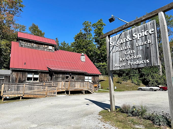 A red-roofed haven of maple-infused delights! This charming wooden structure is where breakfast dreams come true and syrup flows like liquid gold.