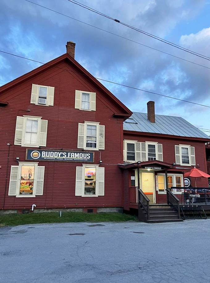 A red-painted slice of Vermont heaven! Buddy's Famous stands proud, inviting you to indulge in comfort food that'll warm your soul faster than a crackling fireplace.
