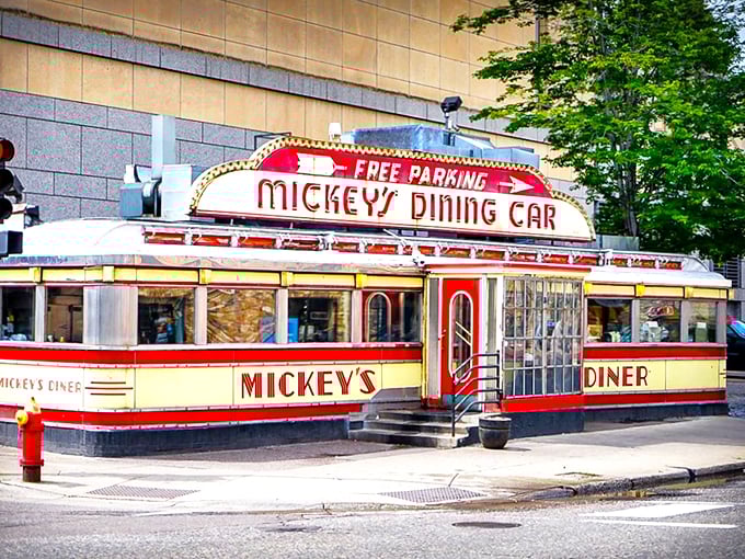 Step into a time machine disguised as a diner! Mickey's iconic exterior gleams like a beacon of nostalgia, promising comfort food and a side of history.