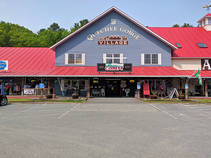 Step right up to nostalgia central! This charming blue-and-red facade isn't just a building&mdash;it's a time machine disguised as the Quechee Gorge Village.
