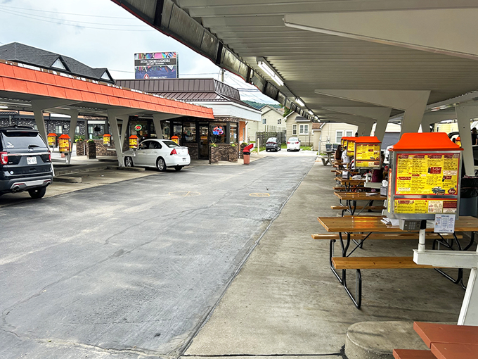 Rudy's Drive In: Where nostalgia meets mouthwatering meals. This retro paradise, complete with covered parking and vibrant menu boards, invites you to step back in time and indulge in classic American fare.