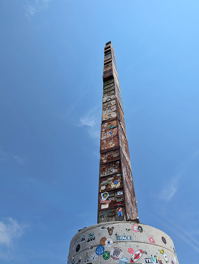 Reaching for the sky, this towering tribute to office supplies stands tall against the azure backdrop. It's like the Empire State Building's quirky cousin decided to visit Vermont!