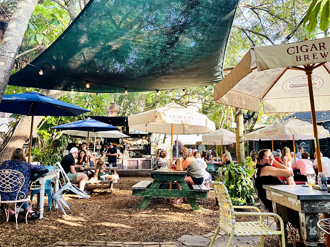 Welcome to seafood paradise! Owen's Fish Camp's exterior is a whimsical blend of coastal charm and jungle-like foliage, inviting you to embark on a culinary adventure.