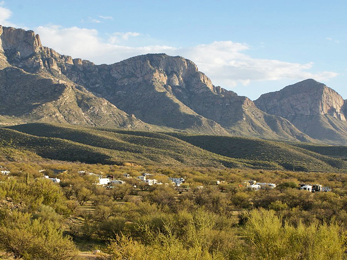 Nature's picturesque view rolls out before you, leading to a mountain extravaganza. It's like the Oscars, but the stars are made of rock!