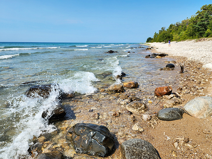 Who needs a desktop wallpaper when you've got this? Lake Michigan's crystal-clear waters meet a pristine sandy beach, creating nature's own screensaver.