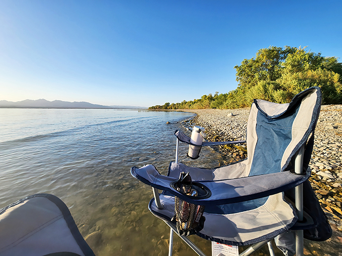 The perfect camping chair moment: where rocky shores meet crystal waters, creating Arizona's answer to a beachfront resort.