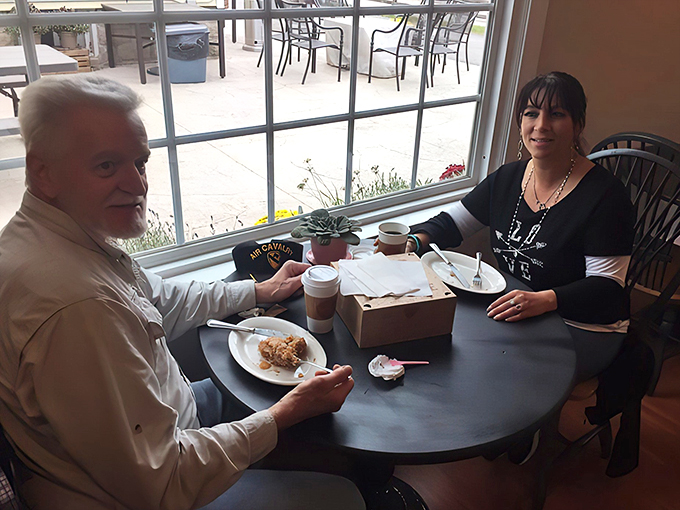 Pie-oneer spirit in action. These diners know the secret to happiness is a fork in one hand and coffee in the other.