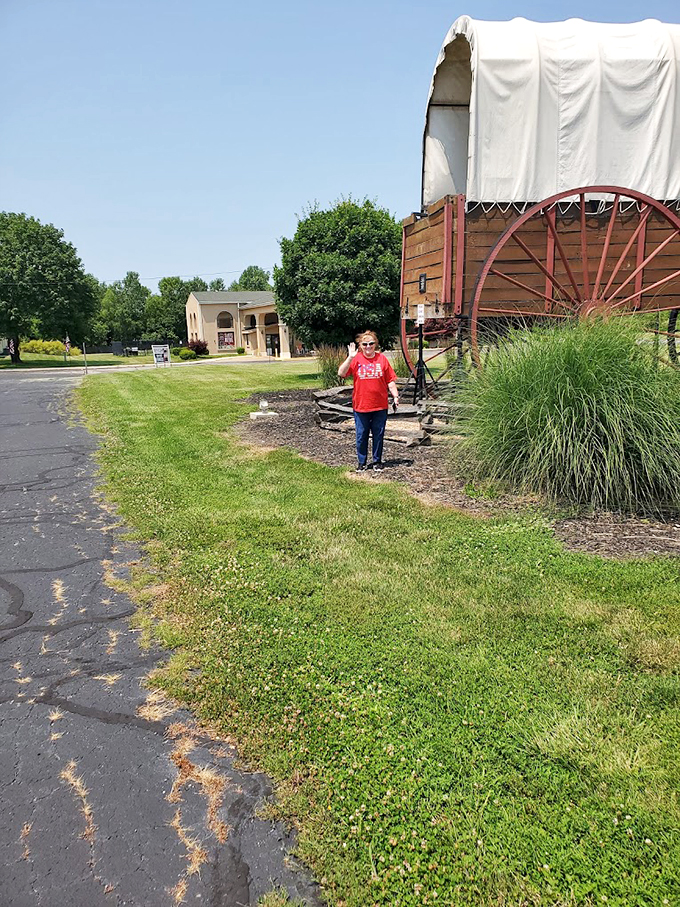 "Say cheese! Or in this case, say 'Westward Ho!'" Families gather to capture memories and ponder life's big questions, like "How many MPG does this thing get?"