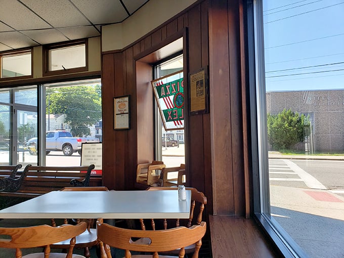 A slice of small-town charm: Pizza by Alex's cozy corner is where memories (and mozzarella) are made.