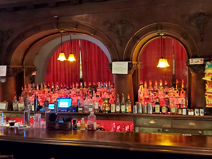 This bar has seen more stories than a library. If only those bottles could talk &ndash; actually, after a few drinks, they might! 