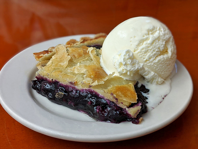 Wild Maine blueberry pie &agrave; la mode: where flaky crust meets berry bliss in a dessert that's worth every mile.