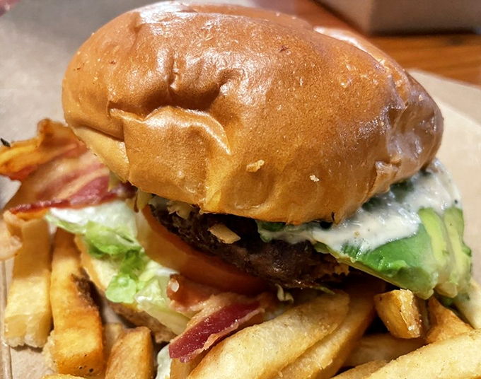 A burger that's dressed to impress, with fresh lettuce and avocado adding California cool to Maine comfort.