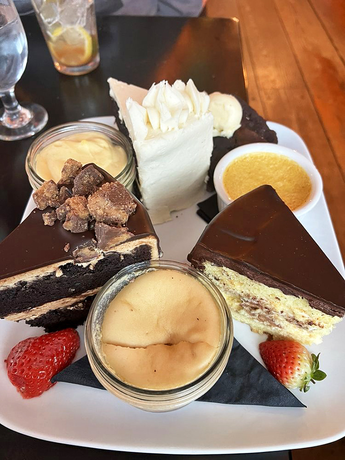 A dessert sampler that's basically a greatest hits album for your taste buds, complete with house-made sauces.